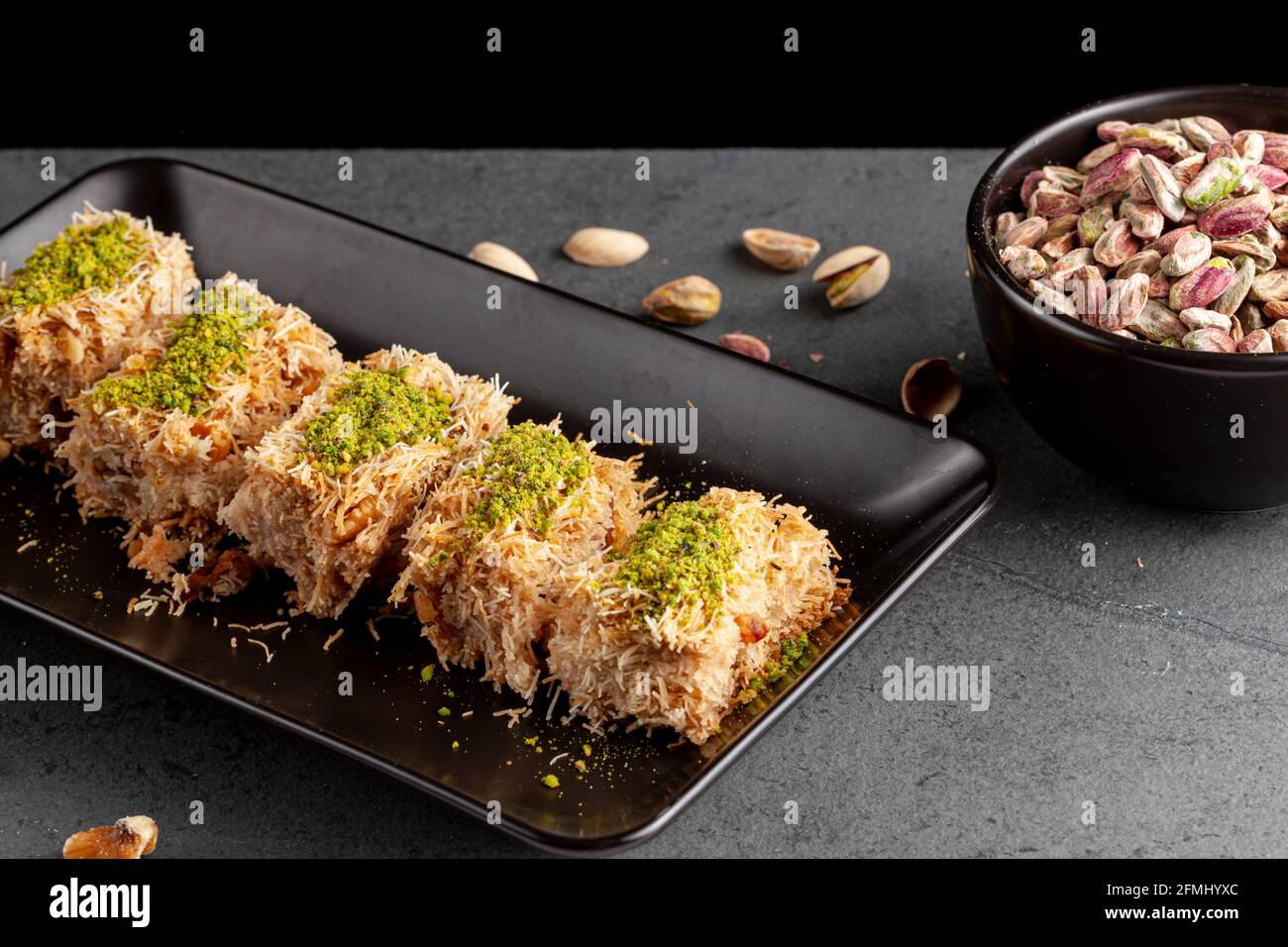 Turkish tel kadayif dessert made from shredded phyllo dough mixed with ...