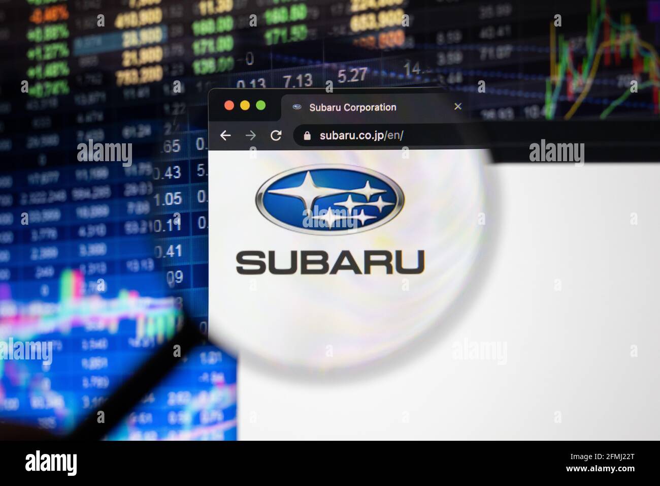 Subaru company logo on a website with blurry stock market developments ...