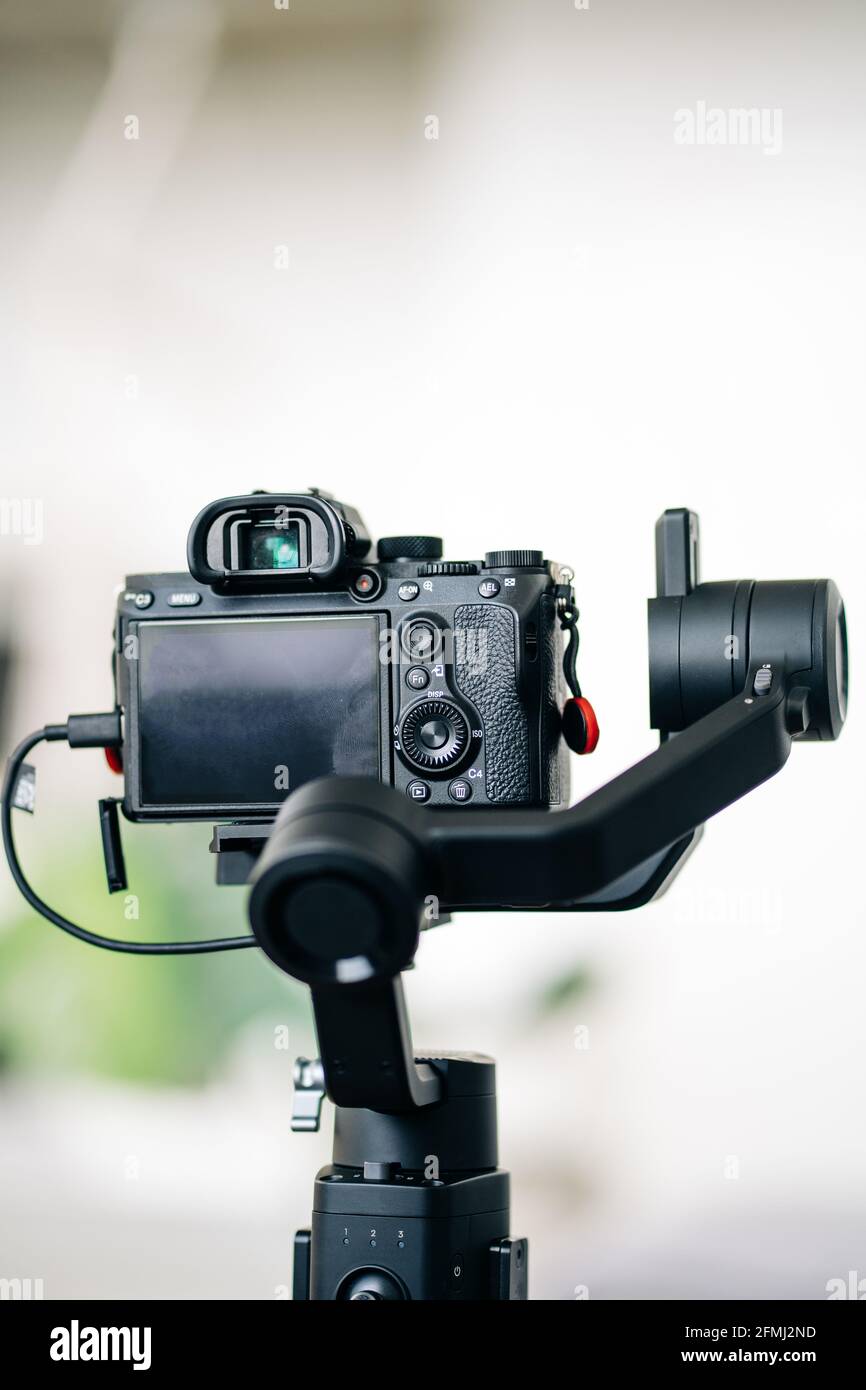 Contemporary digital photo camera with mode dial and viewfinder above ...