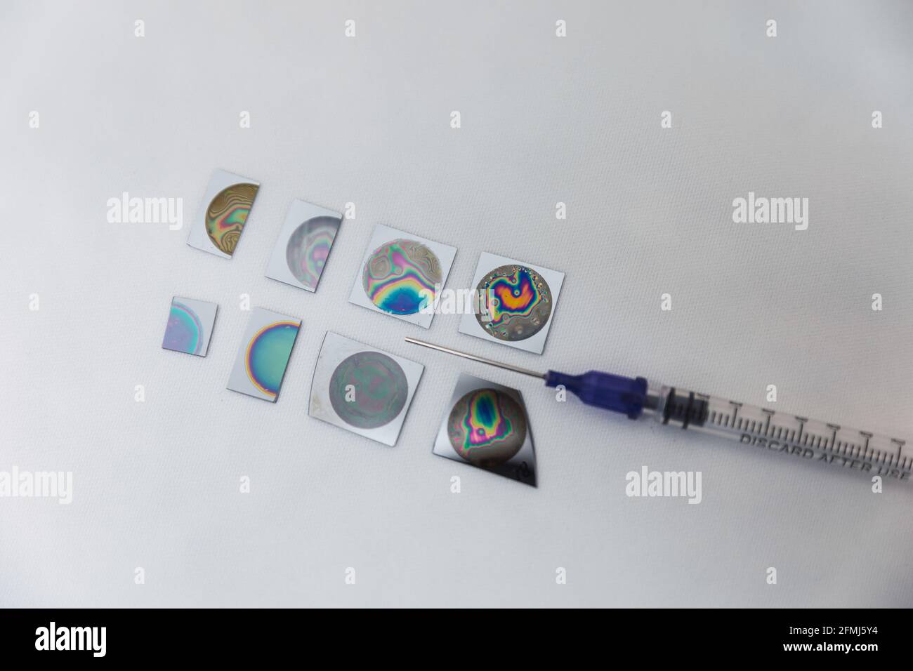 Medical syringe on a white surface hi-res stock photography and images ...