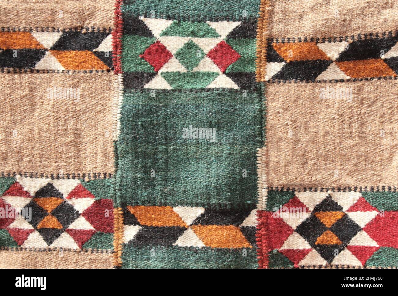 Texture of iranian traditional handmade wool carpet with geometric ...