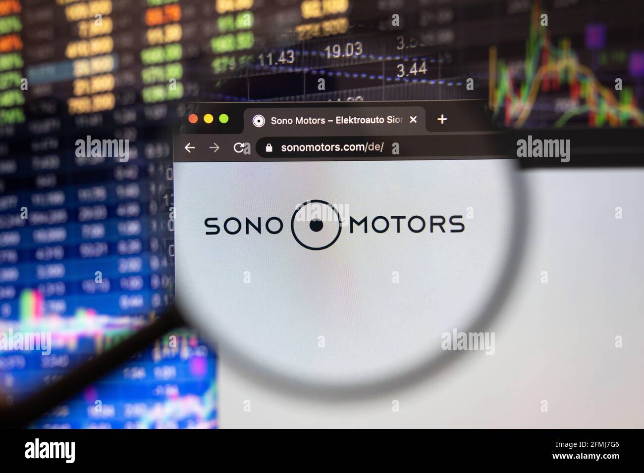 Sono Motors company logo on a website with blurry stock market ...