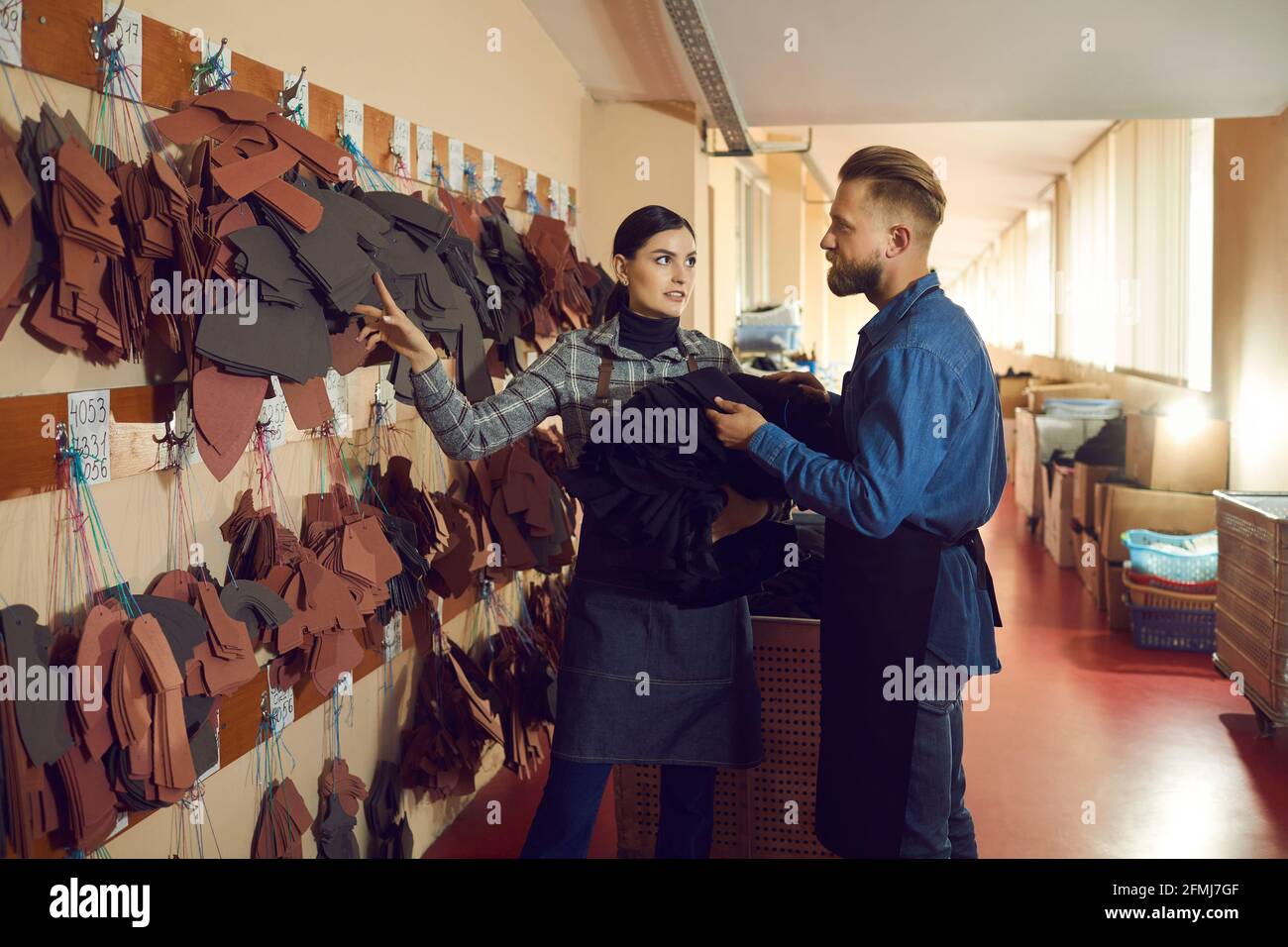 Tailor teaching skill discussing hi-res stock photography and images ...