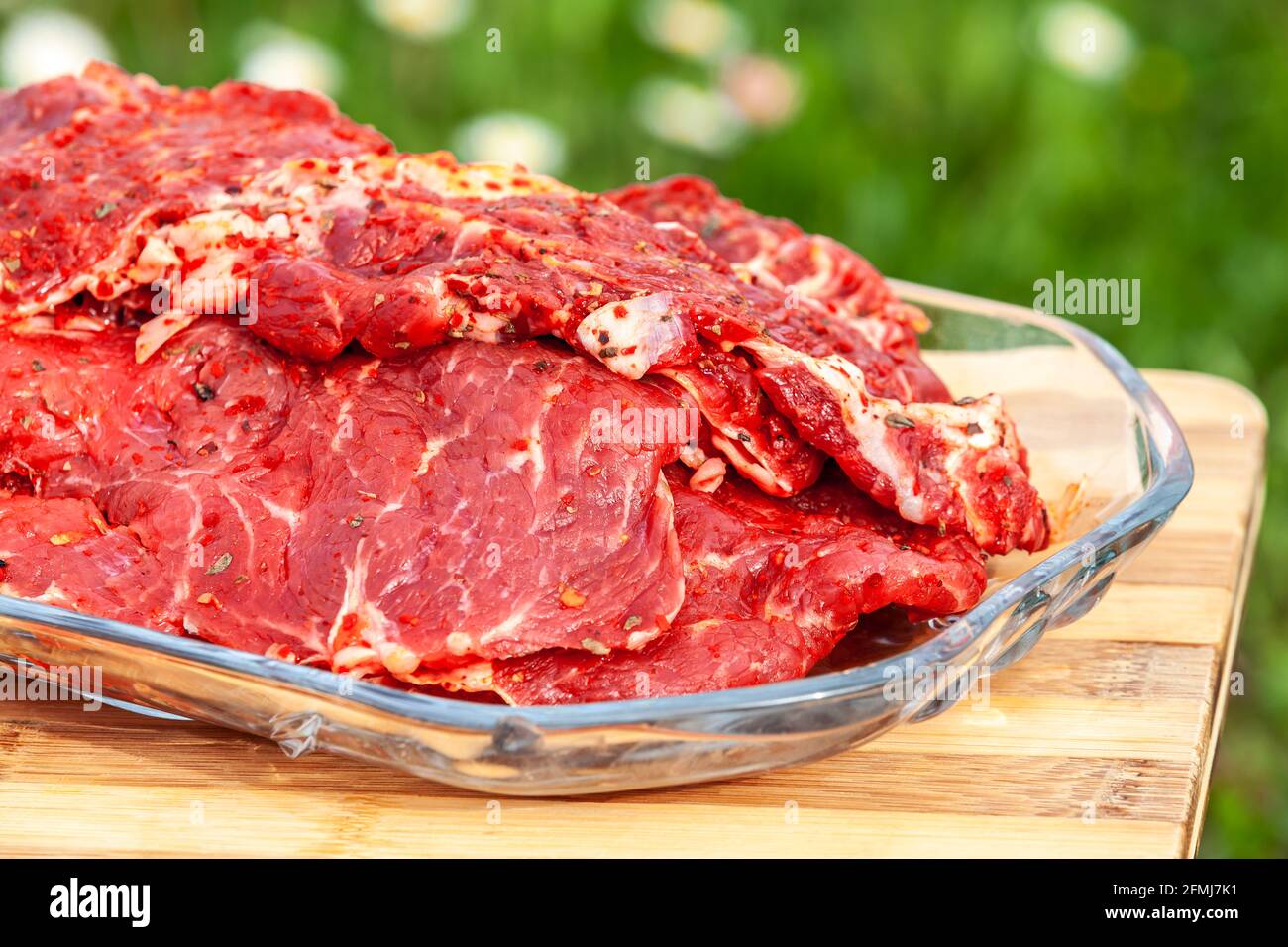 beef flank steak trimmed of fat ready for grilling in picnic Stock ...