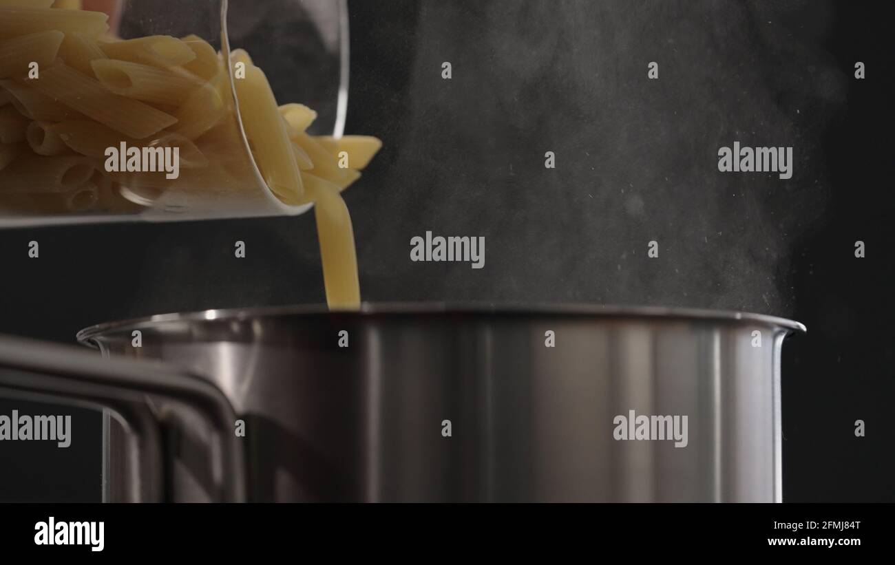 Pasta pot falling hi-res stock photography and images - Alamy