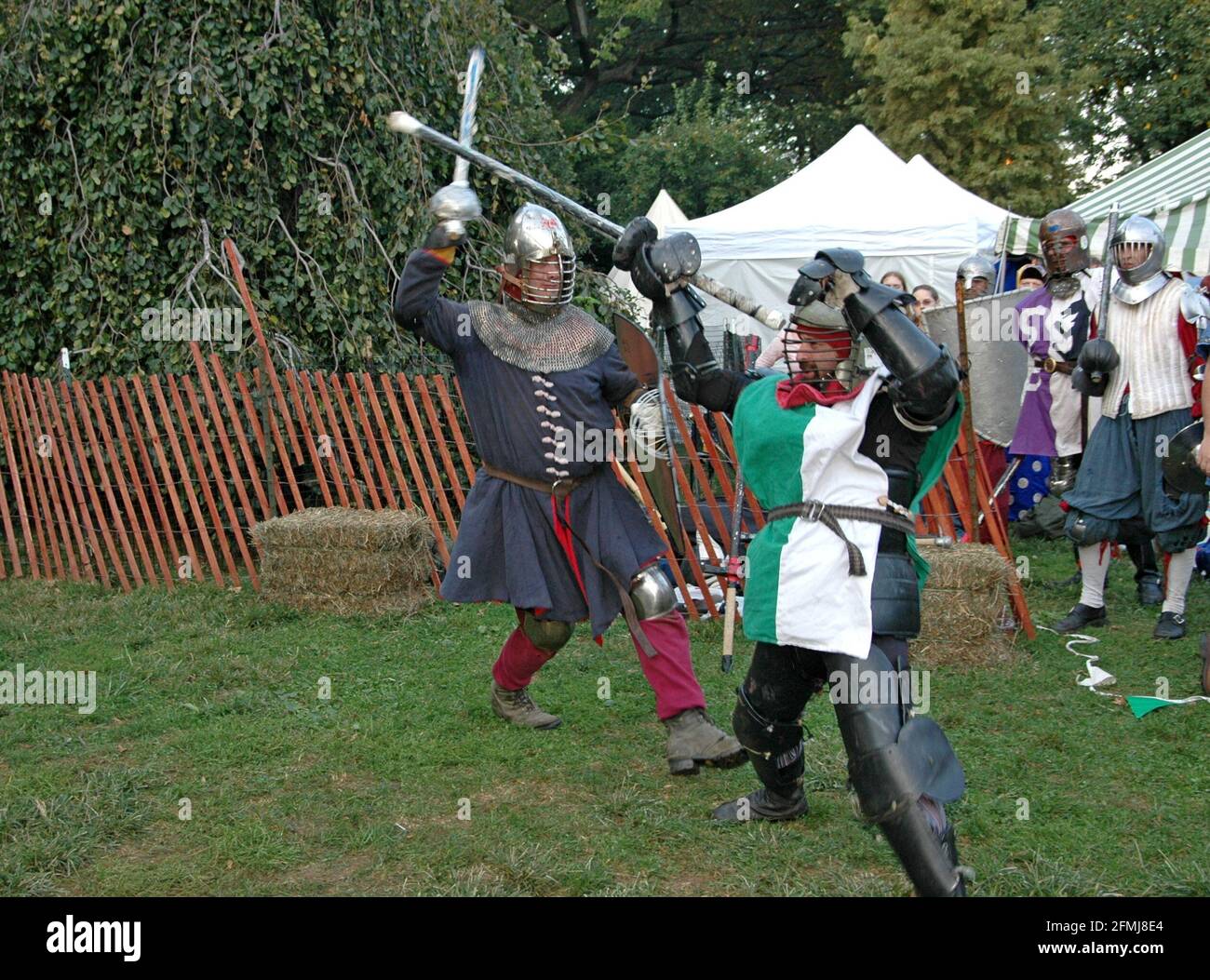 Re-enactors in medieval costume take part in a medieval tournament at ...