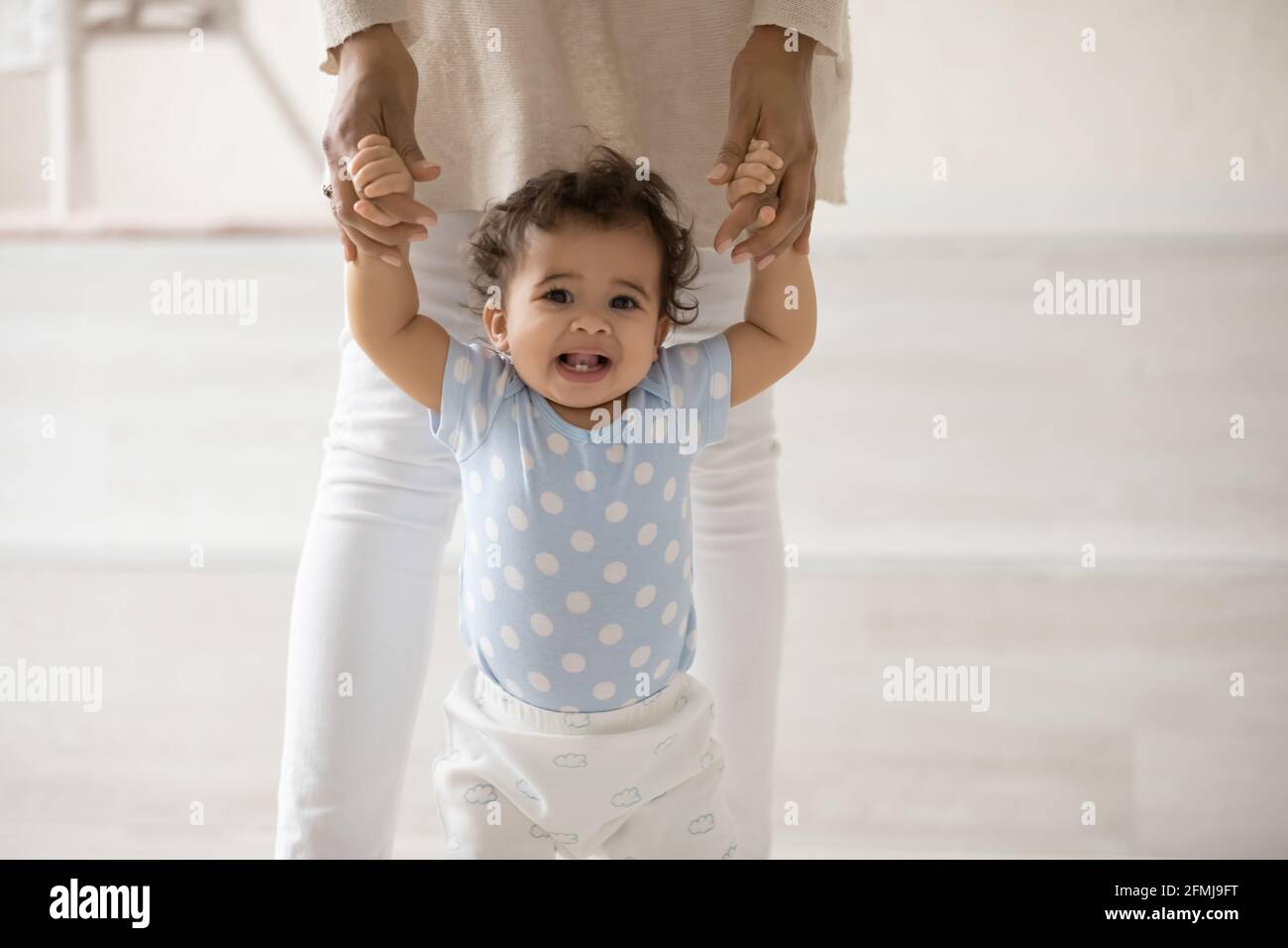 Portrait of small African American baby learn walking Stock Photo - Alamy