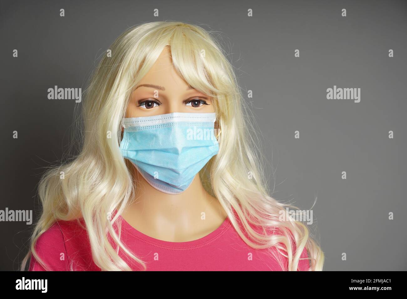 shop window mannequin or display dummy head wearing protective face ...