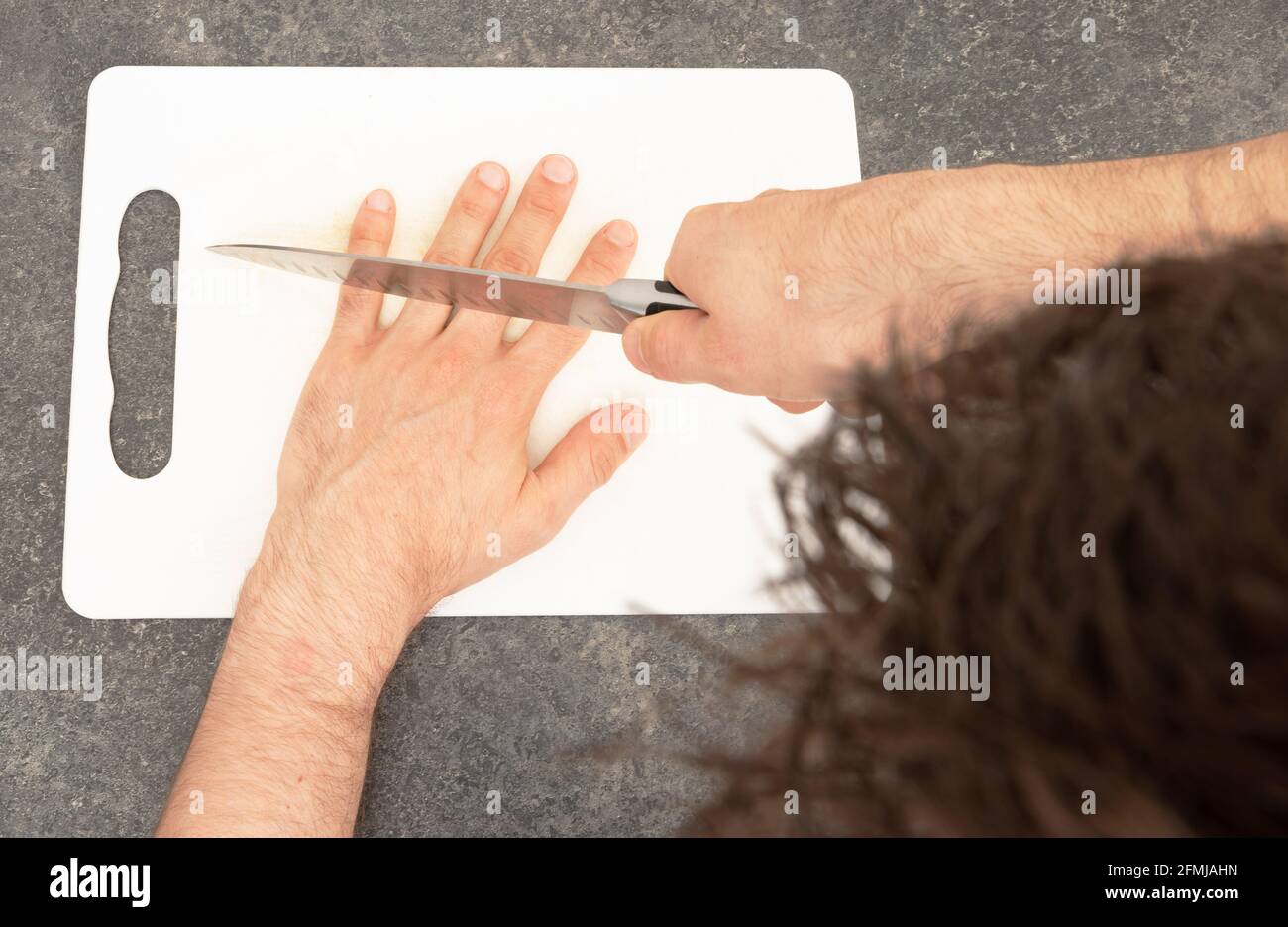 Cutting the fingers with knife - Preparation - Isolated on white Stock ...
