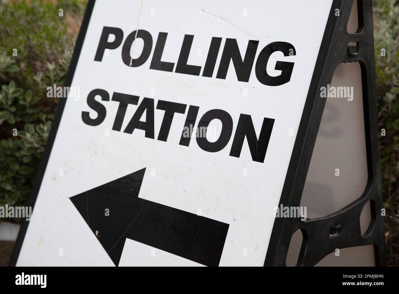 Polling station sign outside the entrance to a political voting ...