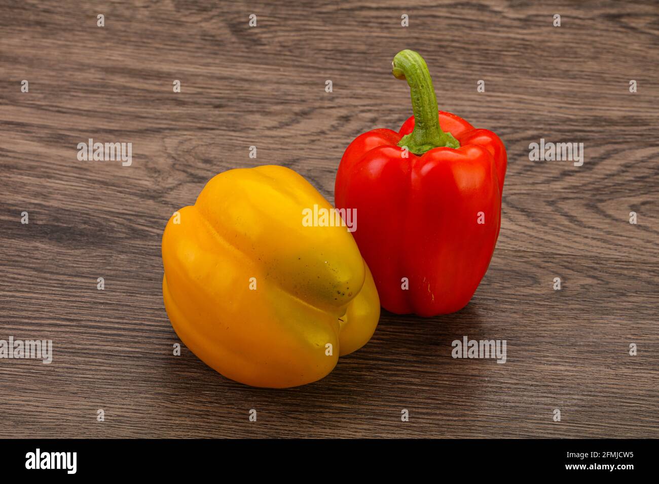 Two Ripe sweet Bulgarian bell peppers Stock Photo - Alamy