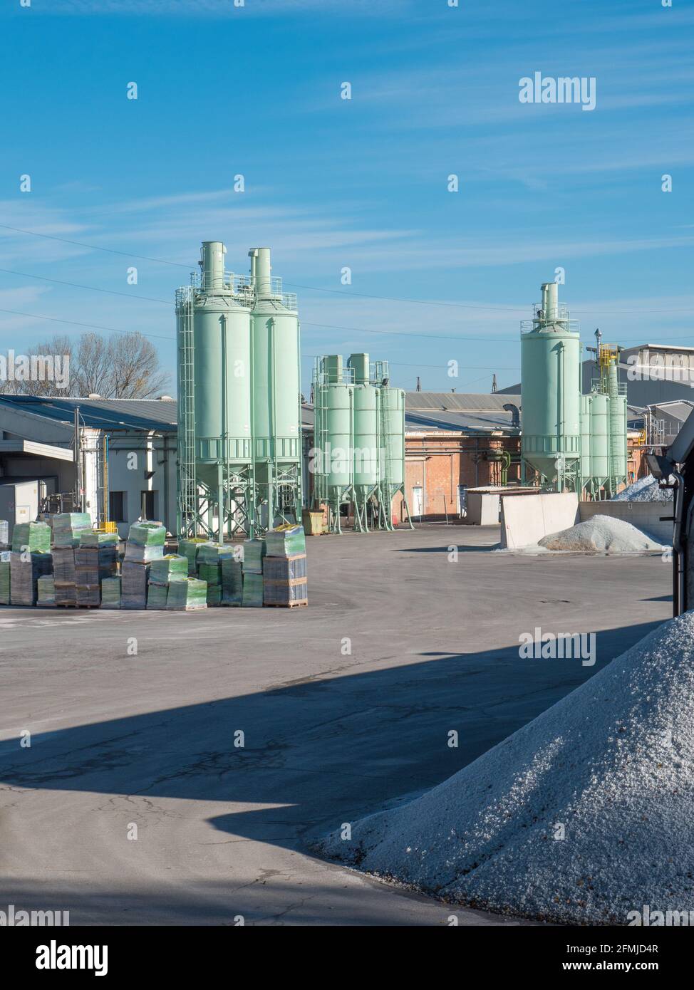 Outdoor Space of a Glass Factory with Vertical Tanks and selected Glass ...