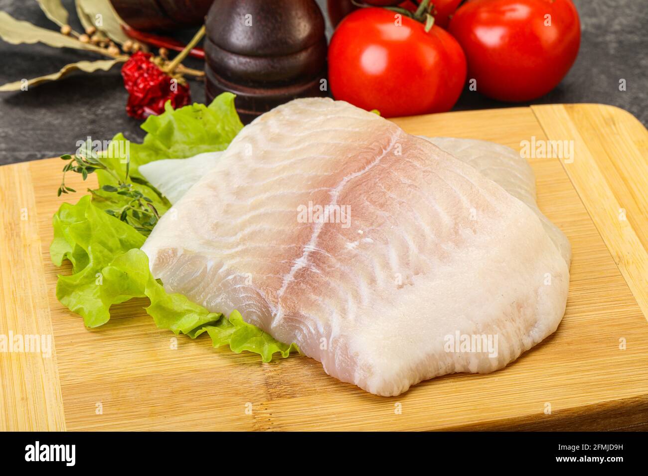 Raw pangasius fillet fish for cooking Stock Photo - Alamy