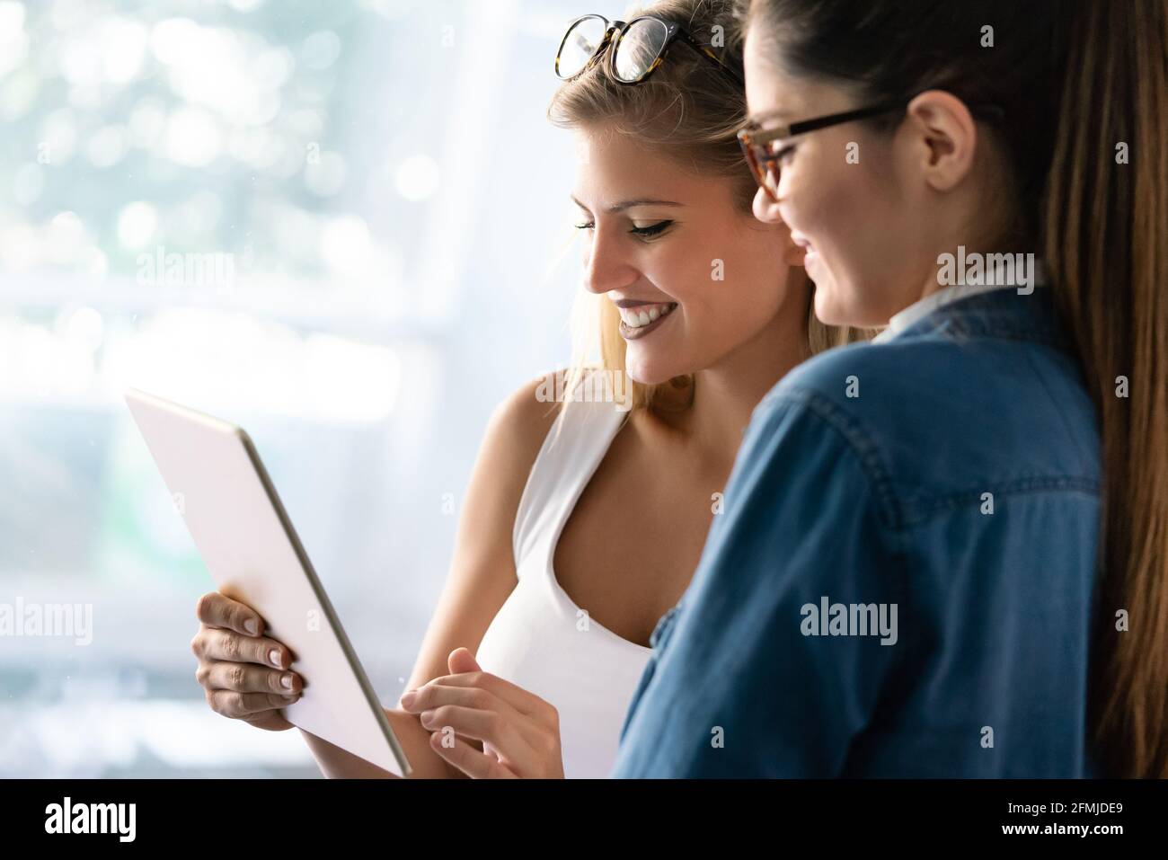 Happy girl friends spending time together, having fun and social ...