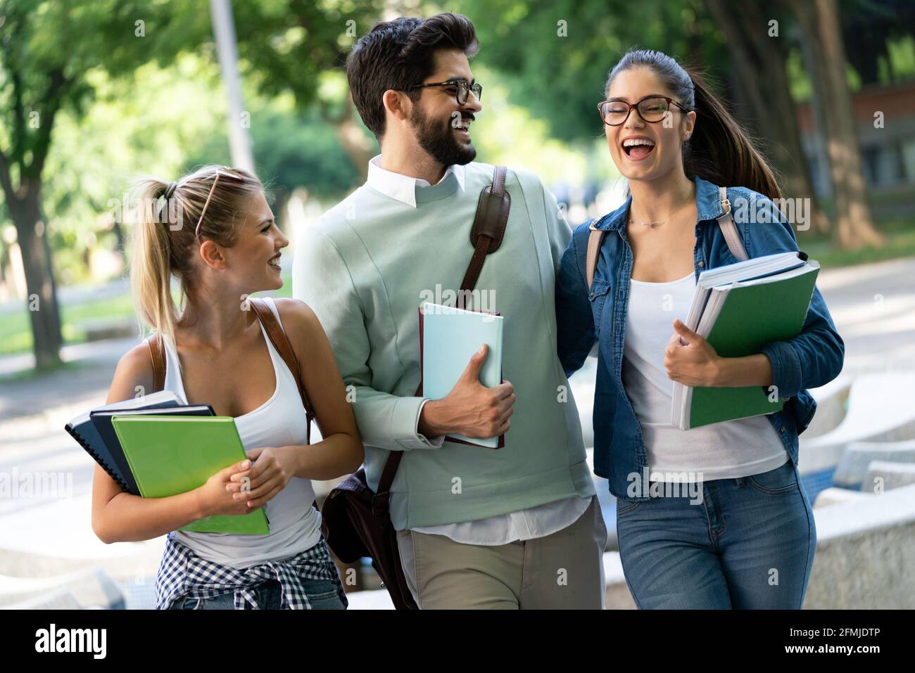College students studying on university campus outdoor Stock Photo - Alamy