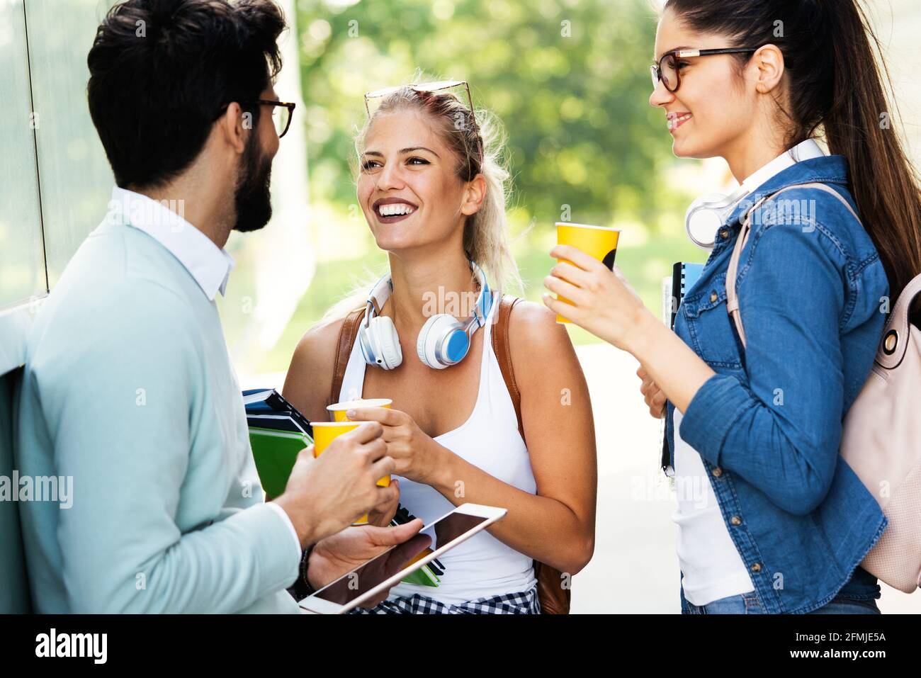 Happy university students hi-res stock photography and images - Alamy