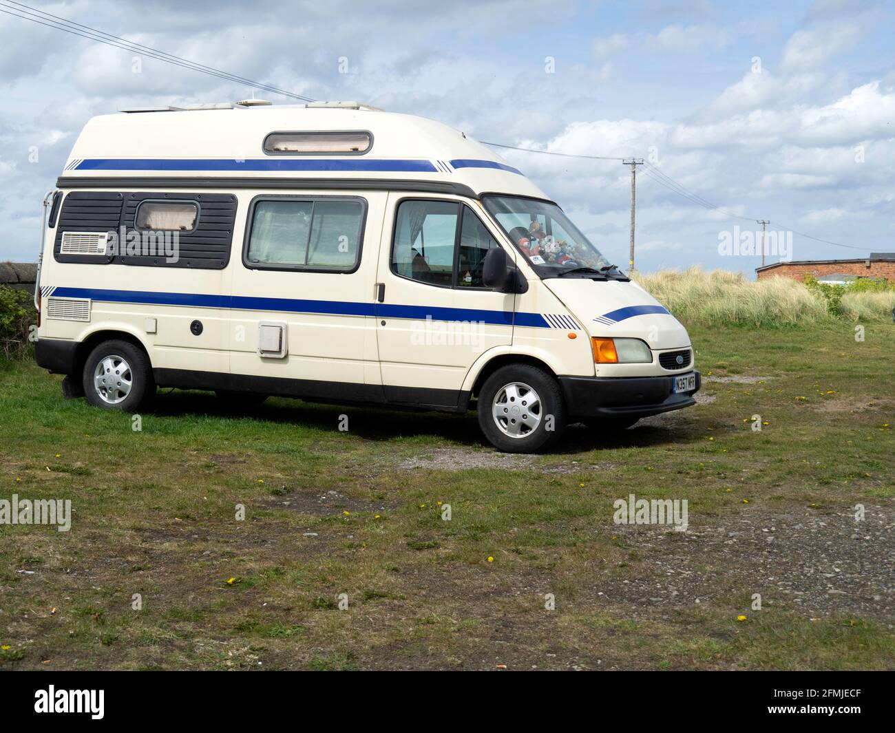 A 1995 Ford motor caravan, parked at the seaside in Teesmouth North ...