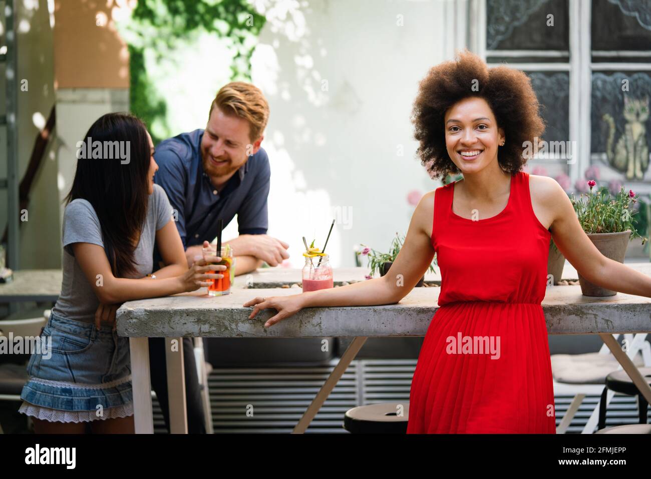 Group of friends having fun together. People talking laughing and ...