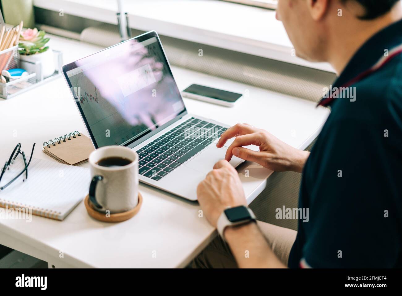 man typing on mockup laptop Stock Photo - Alamy