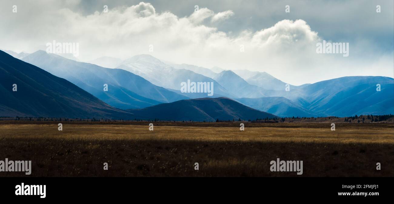 Panorama view of Ben Ohau Range in the mist, Twizel, South Island Stock ...