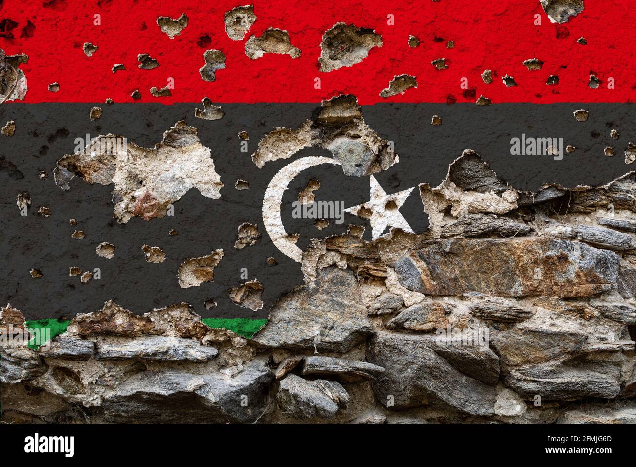 Concept of the Political Situation in Libya with a damaged painted flag ...