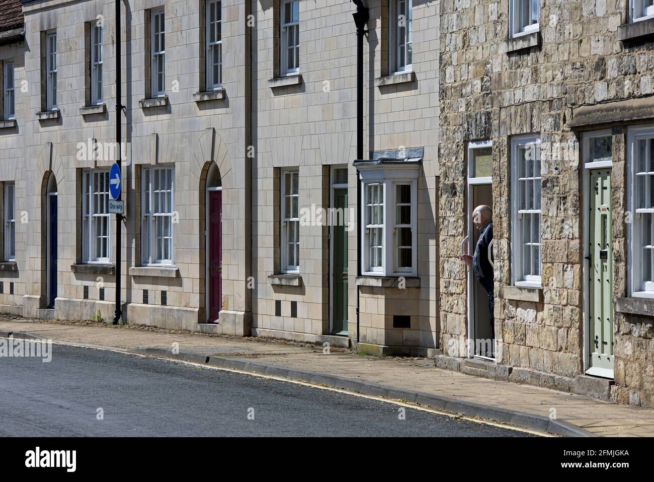 Terrace of houses built from the local limestone, Tadcaster, North ...