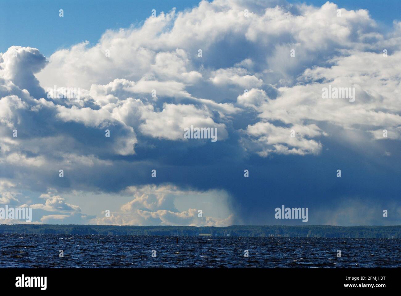 Rain cloud over landscape Stock Photo - Alamy