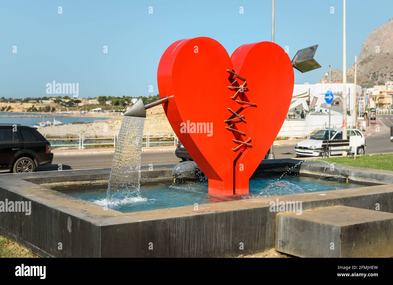 Waterfront promenade of Terrasini with installation Broken Heart ...