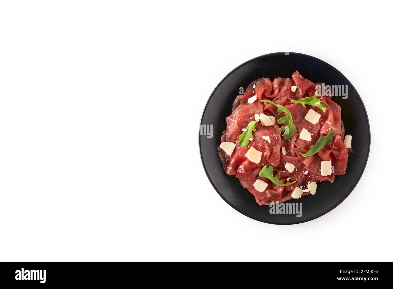 Marbled beef carpaccio on black plate isolated on white background ...