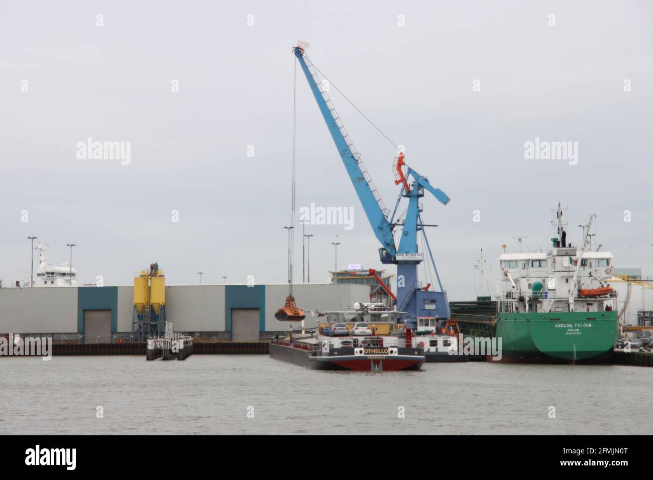 Bulk ships and cranes in de Merwehaven harbor as part of the port of ...