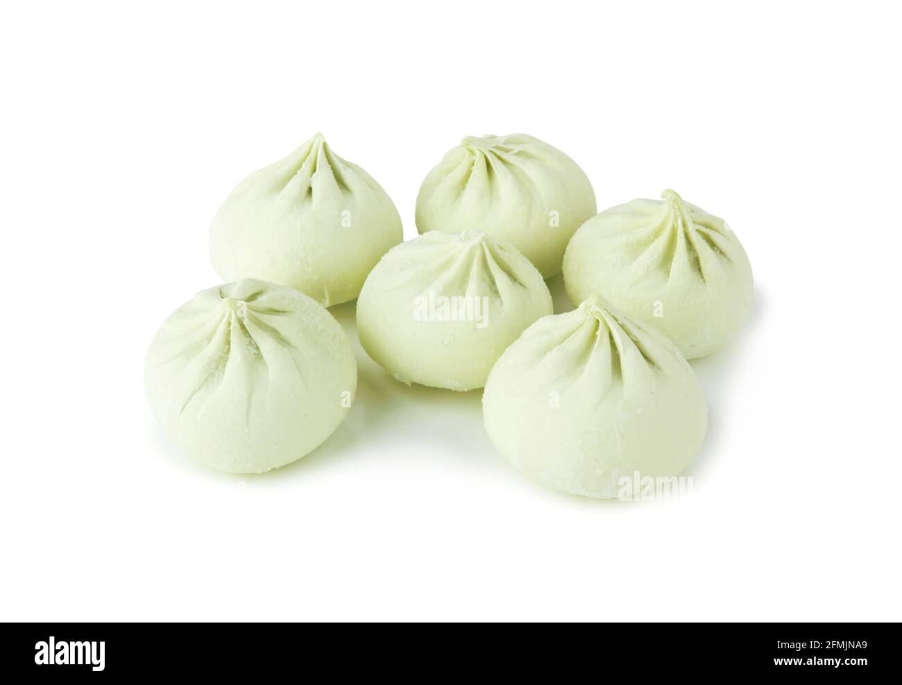 Frozen green khinkali isolated on white background Stock Photo - Alamy