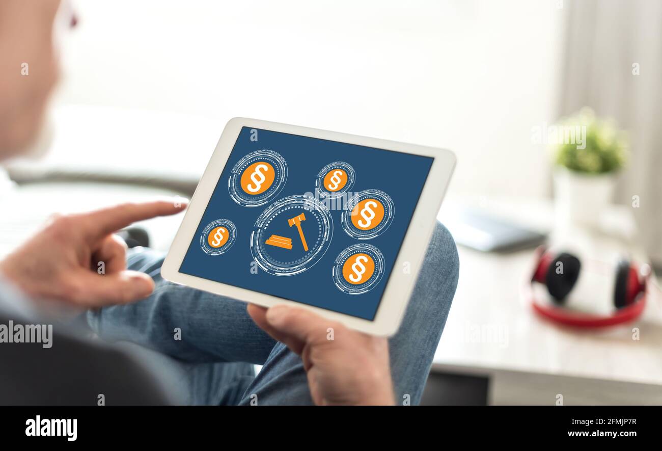 Tablet screen displaying a justice concept Stock Photo - Alamy