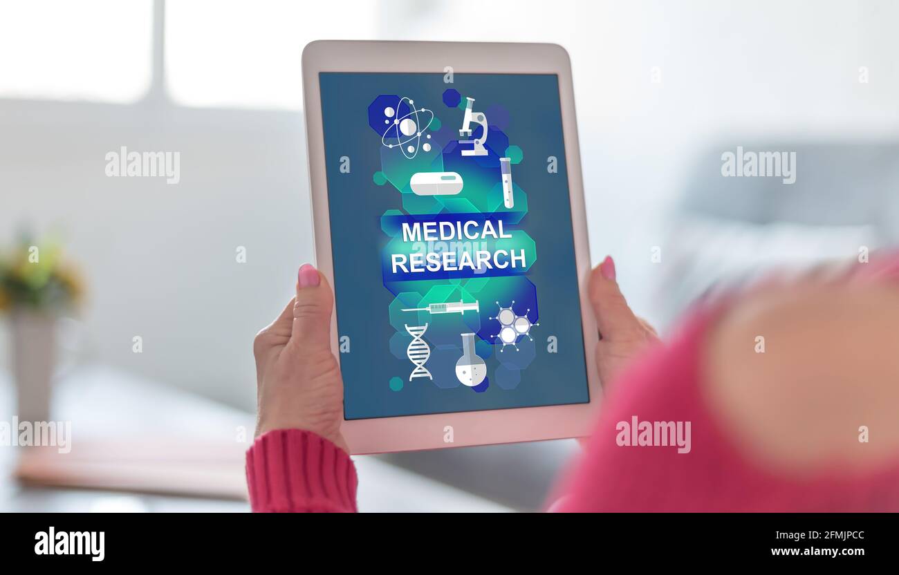 Tablet screen displaying a medical research concept Stock Photo - Alamy