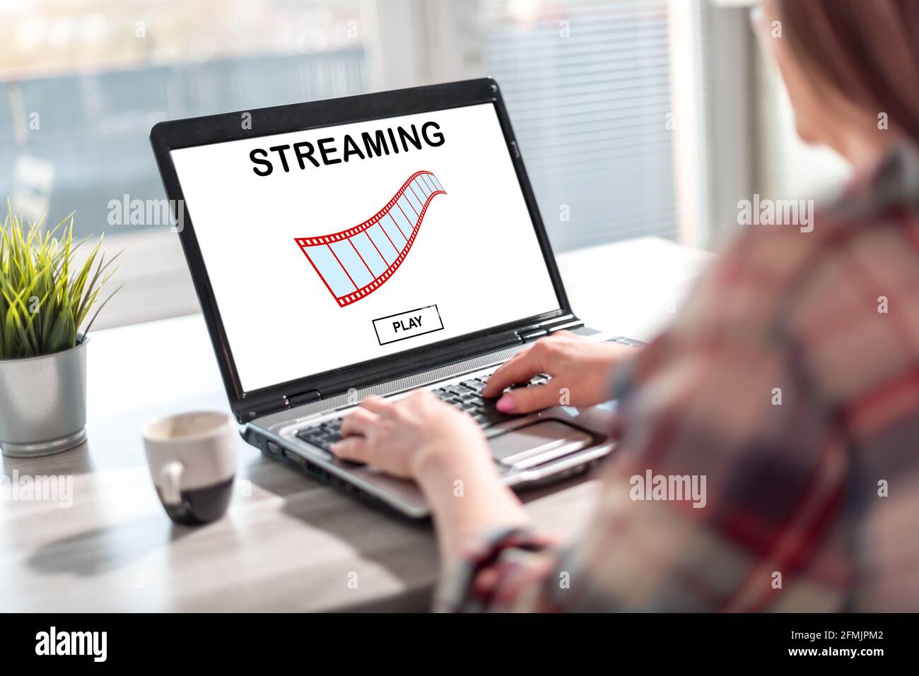 Laptop screen displaying a video streaming concept Stock Photo - Alamy