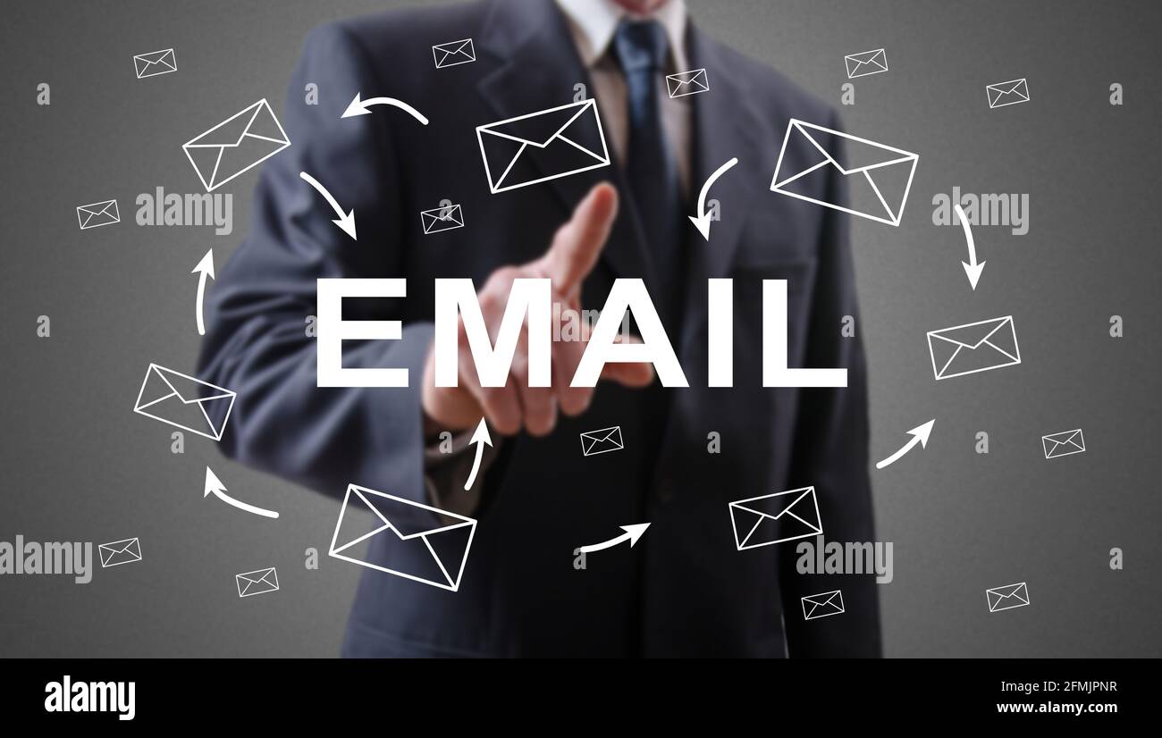 Email concept shown by a businessman in background Stock Photo - Alamy