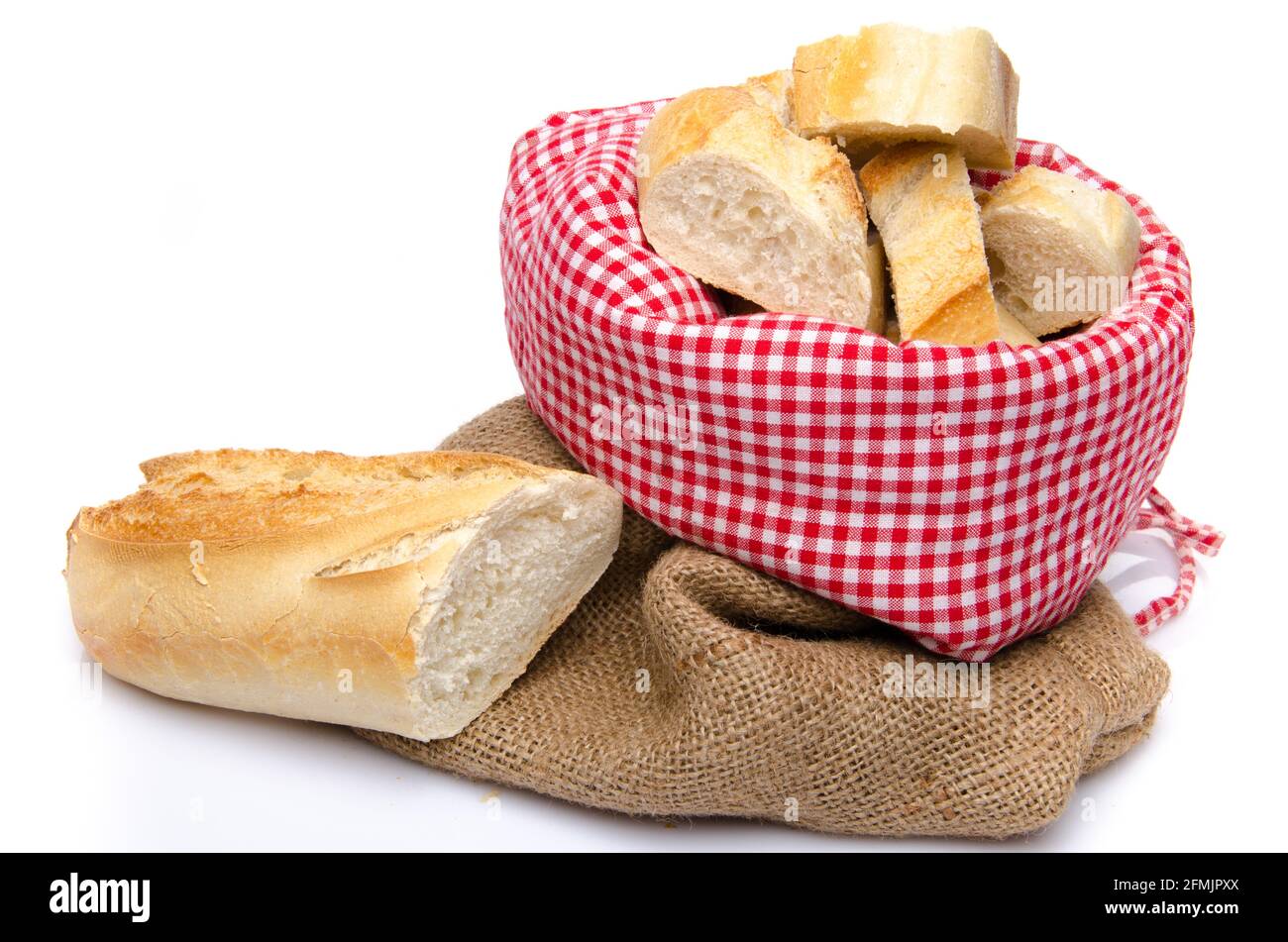 Pieces of baguette in a bag, isolated on white Stock Photo - Alamy