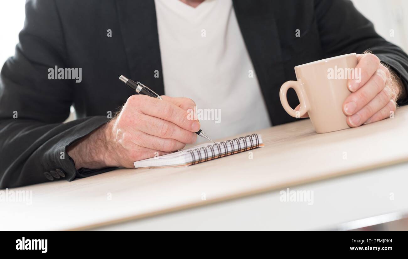 Man business take notes notebook work hi-res stock photography and ...