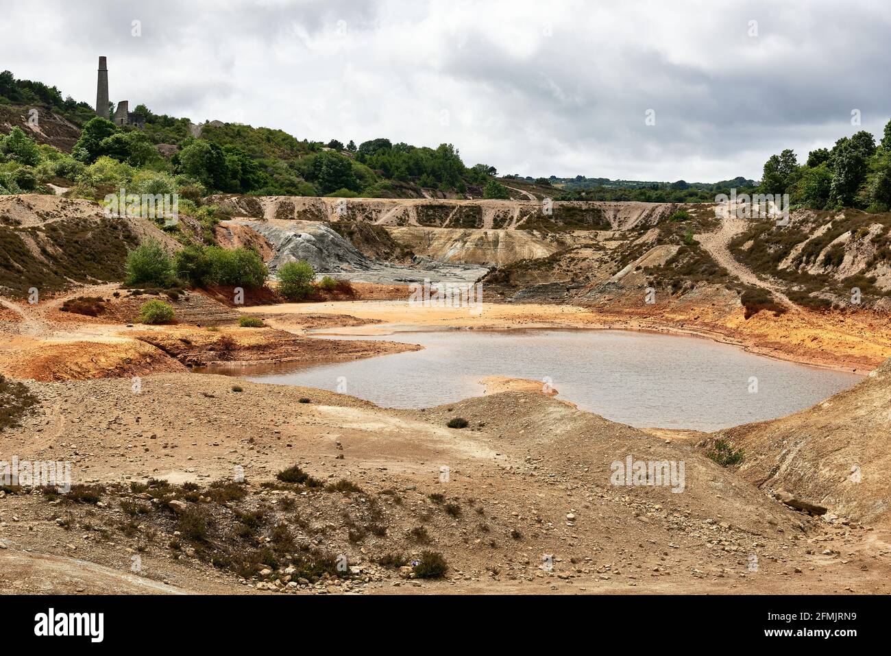 Abandoned copper mine and tailings lagoon at Wheal Maid Valley, St. Day ...