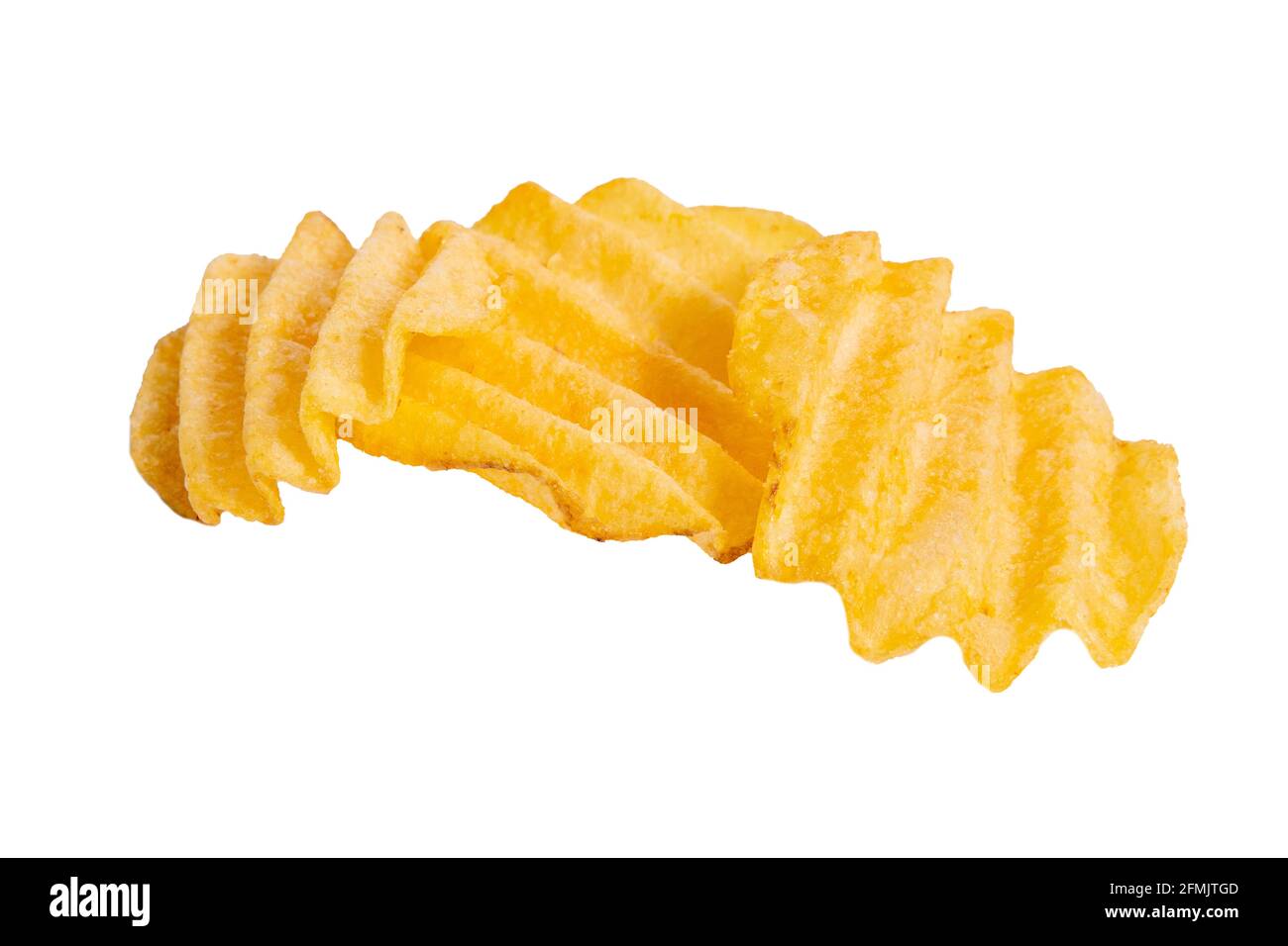 Pile of potato chips fluted close-up on a white background. Isolated ...