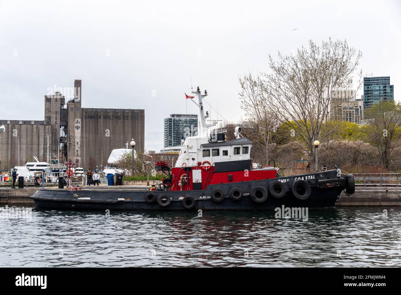 Omni Coastal tug boat moored in the Toronto waterfront, Canada. This ...