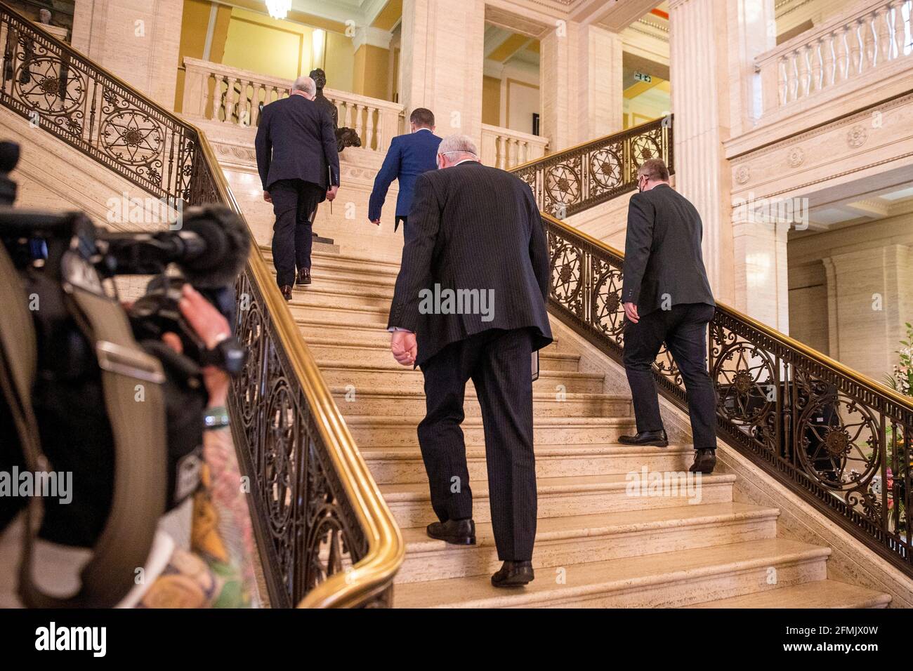 Steve Aiken (centre) leads away his party colleagues Danny Kennedy ...