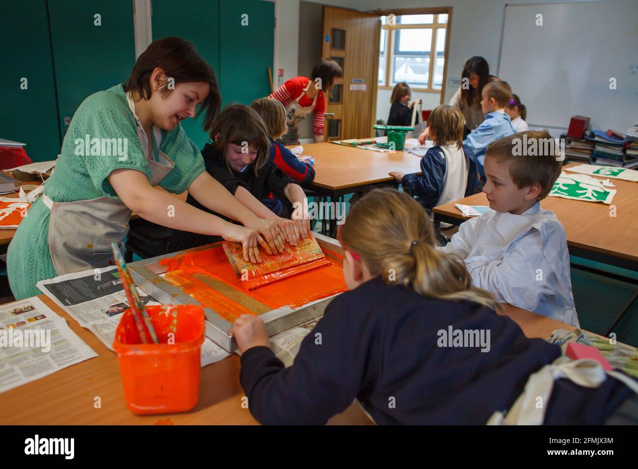 Junior School Art lesson screen printing Stock Photo - Alamy