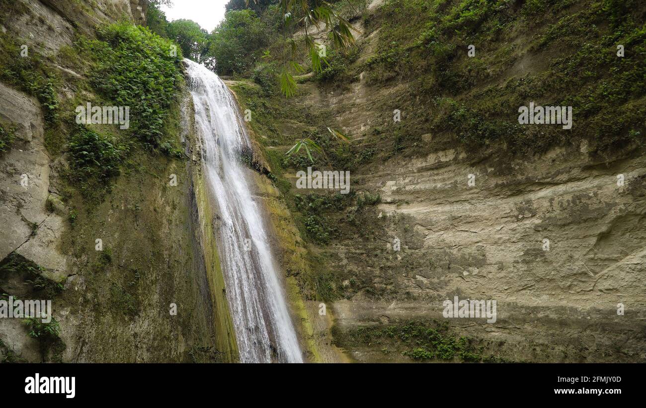 Beautiful waterfall in green forest. Tropical Dao Falls in mountain ...
