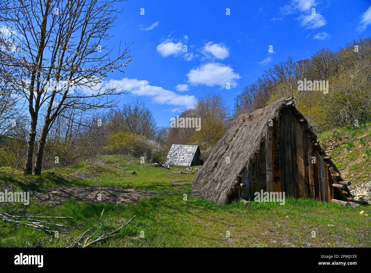 old huts in the forest Stock Photo - Alamy