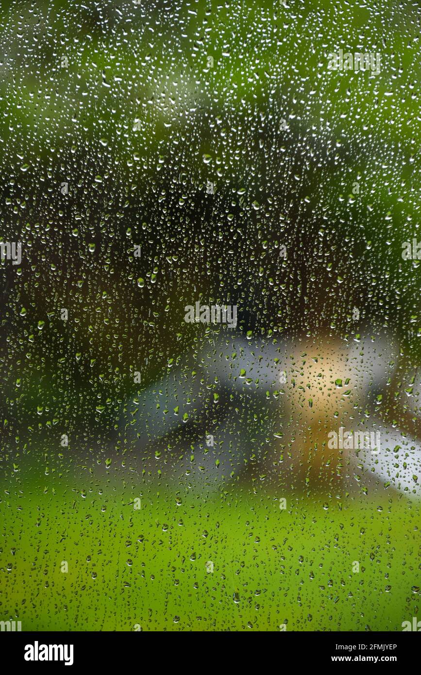 Water droplets on glass window pane from rain Stock Photo - Alamy