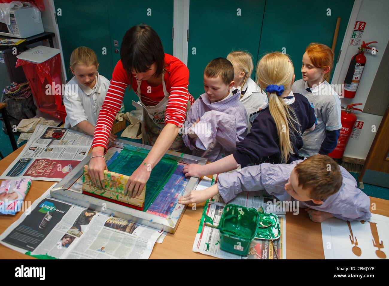 Junior School Art lesson screen printing Stock Photo - Alamy