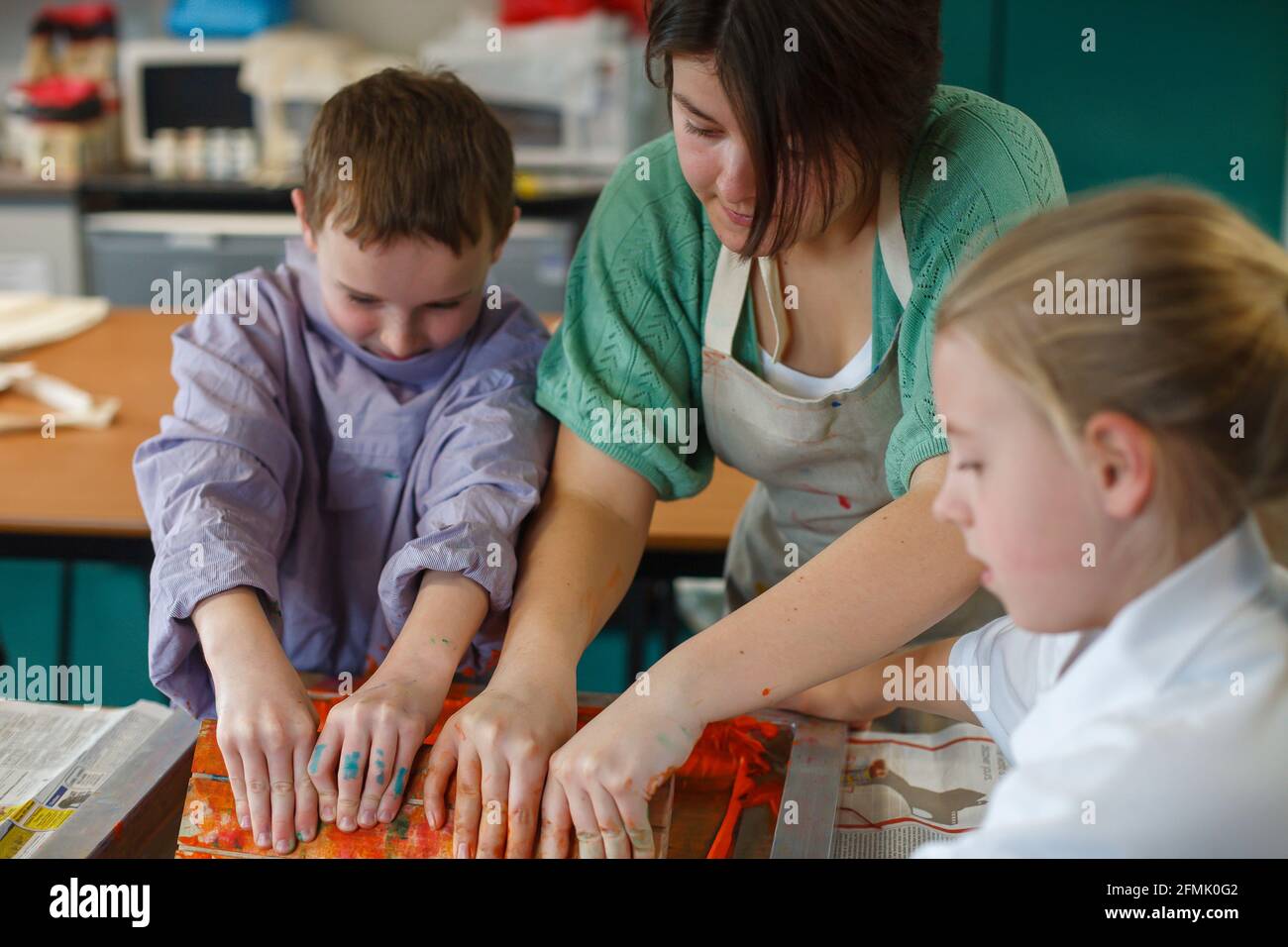 Junior School Art lesson screen printing Stock Photo - Alamy