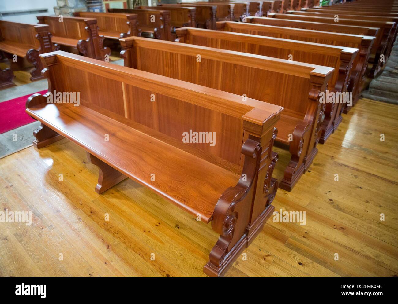 wooden benches of church Stock Photo - Alamy