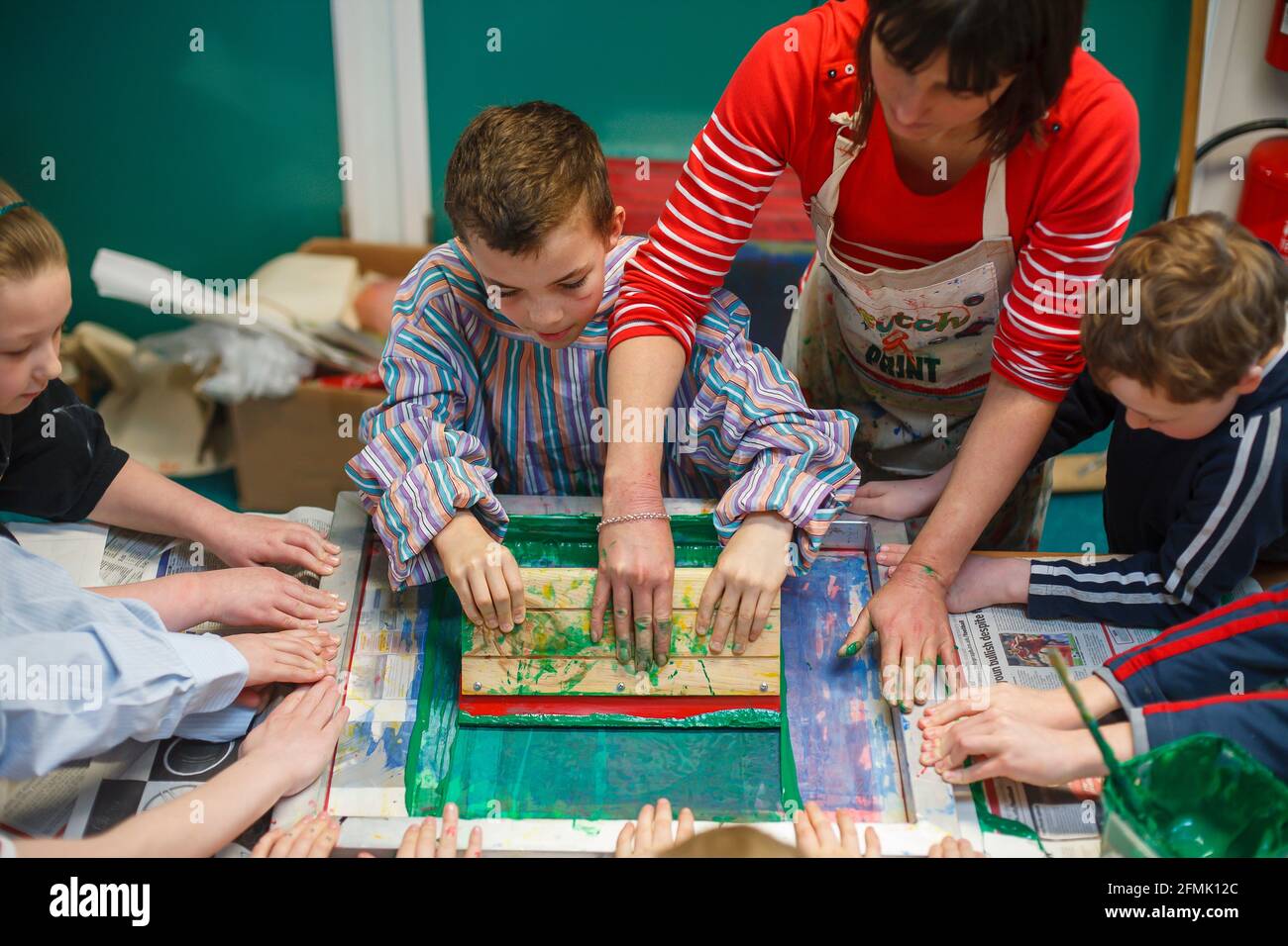 Junior School Art lesson screen printing Stock Photo - Alamy