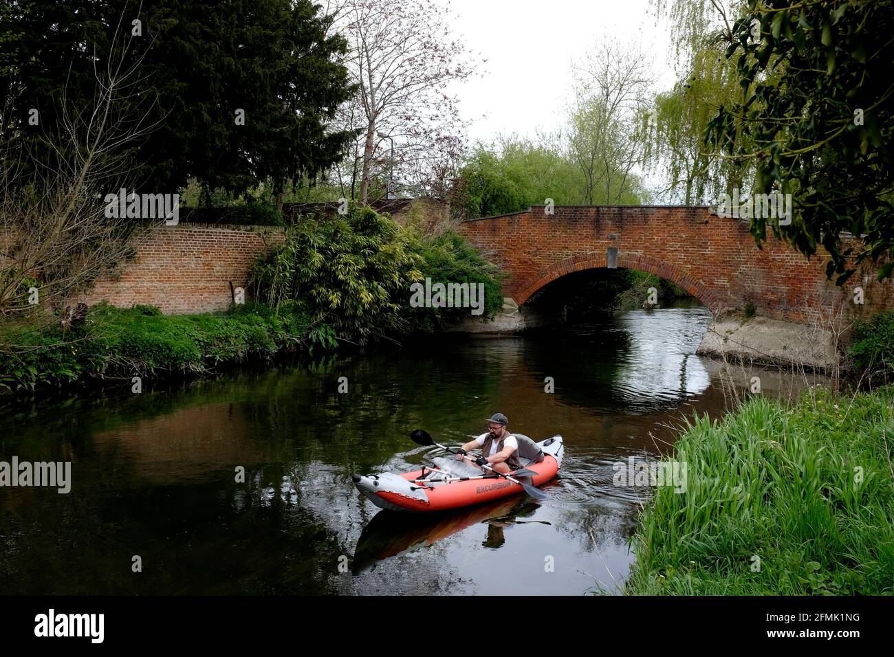 fordwich town listed bridge showing river stour with man on a boat east ...